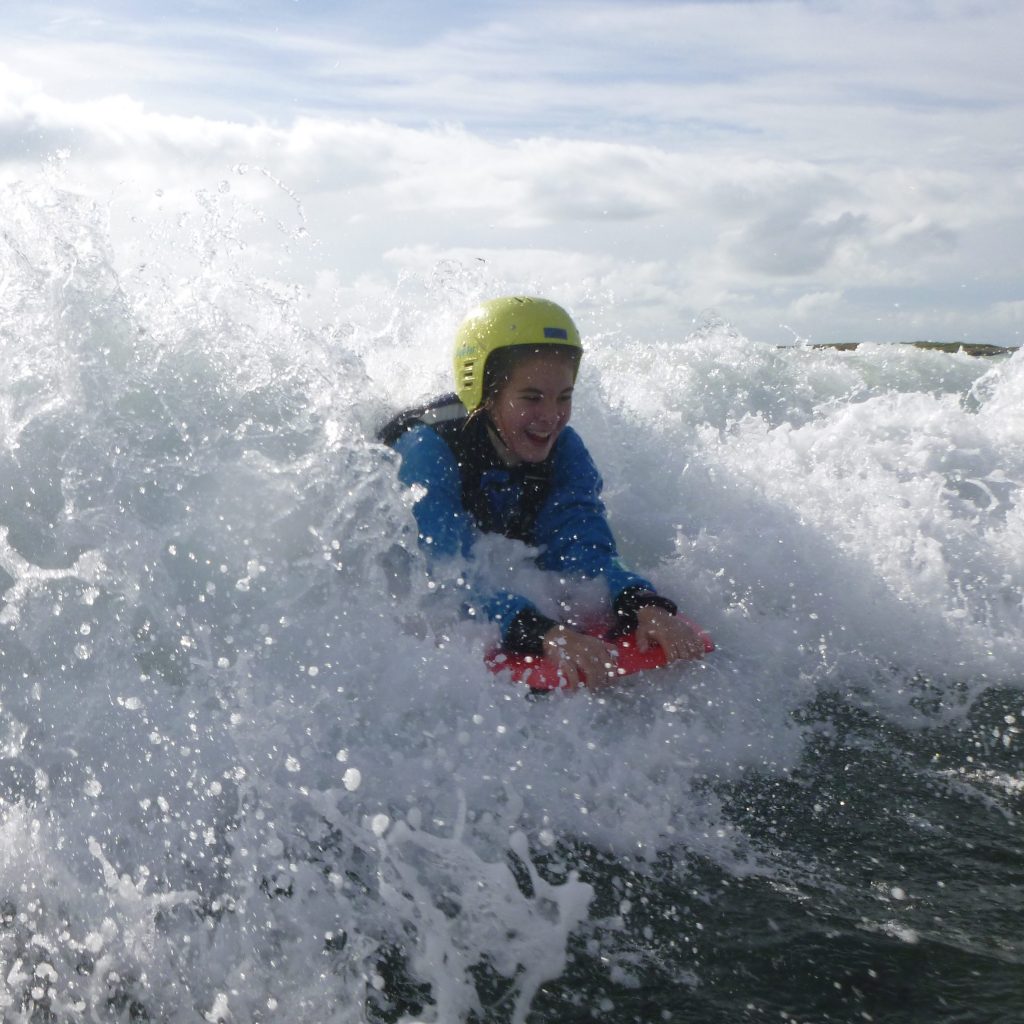 Beaches and rolling waves, enjoy surfing Anglesey | Arete Centre.